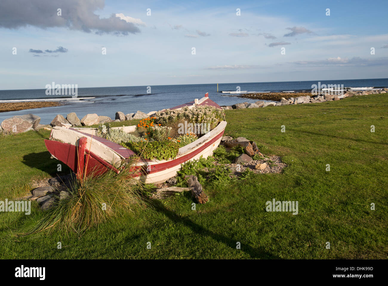 Village of Brora, Scotland. Picturesque view of an old boat on the ...