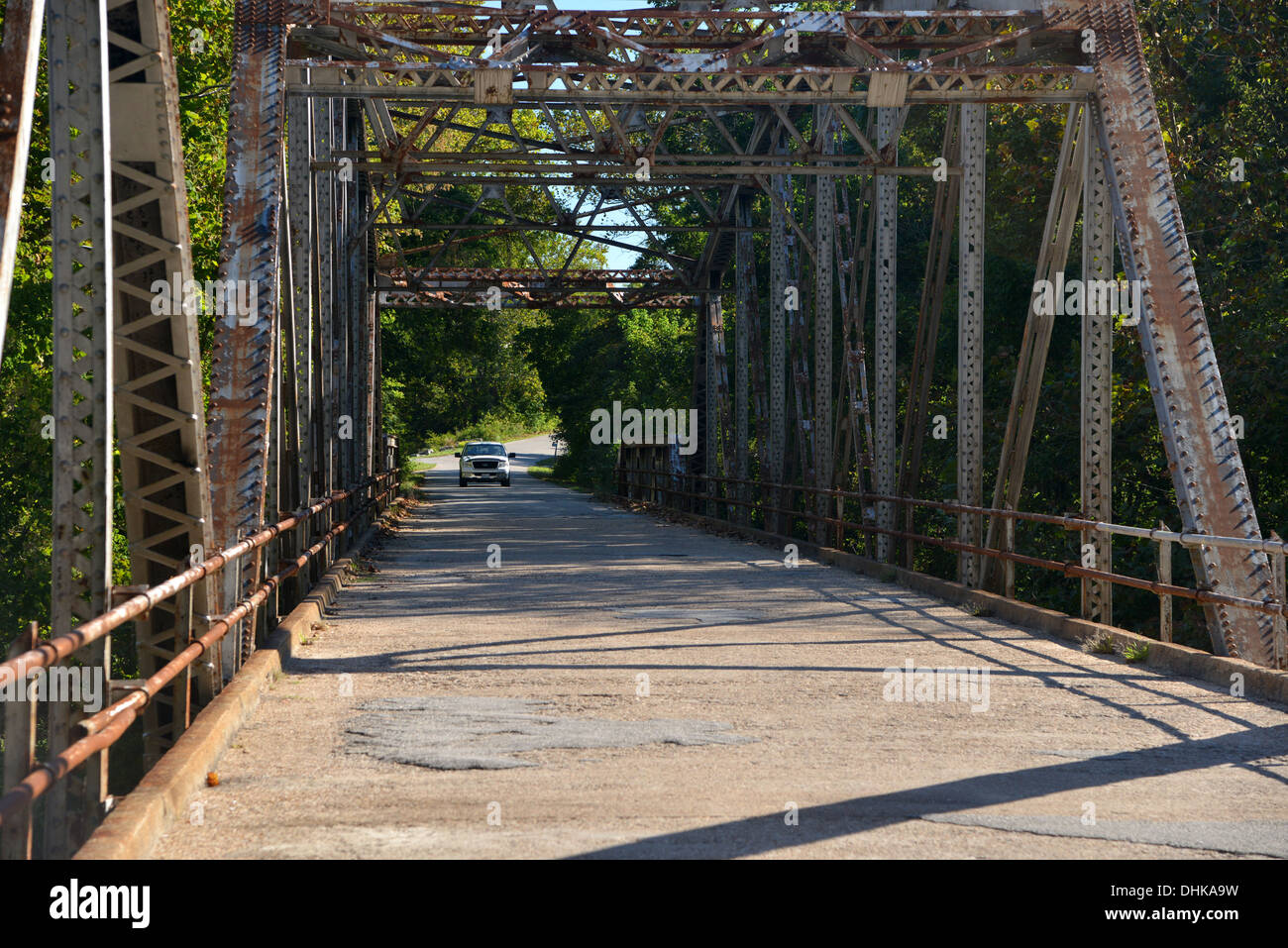 Old truss girder box bridge crosses a river on old Route 66 in rural ...