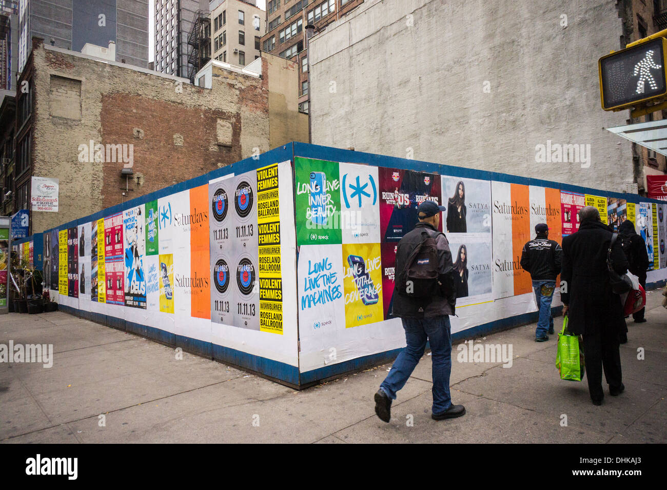 Construction shed posted with advertising in Midtown Manhattan in New ...