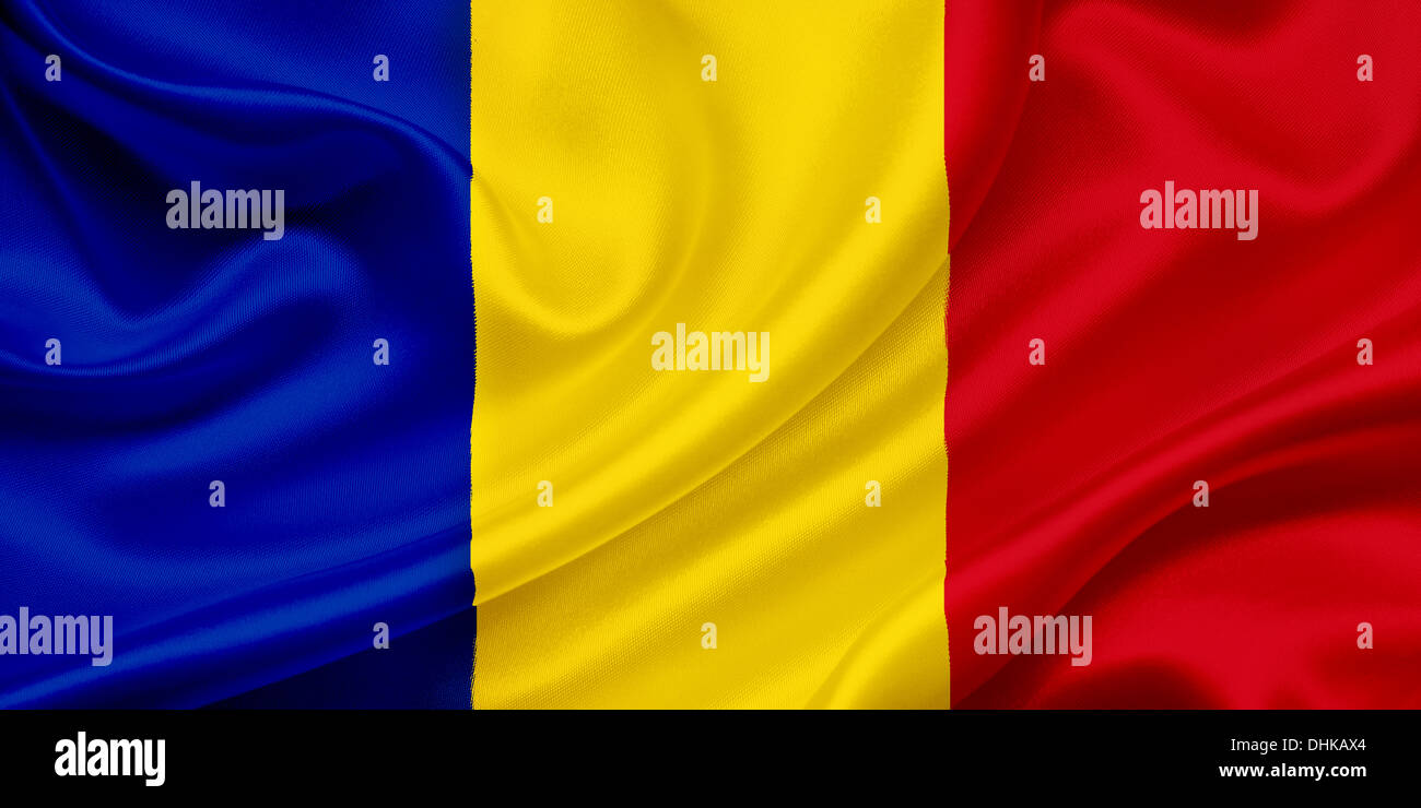 Flag of Romania Waving In The Wind Stock Photo - Alamy