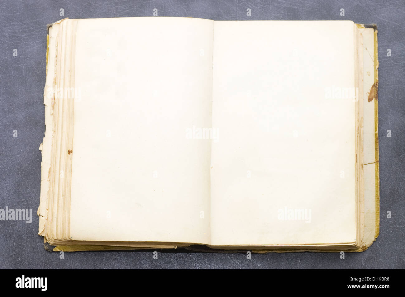 The ancient book on a grey Stock Photo - Alamy