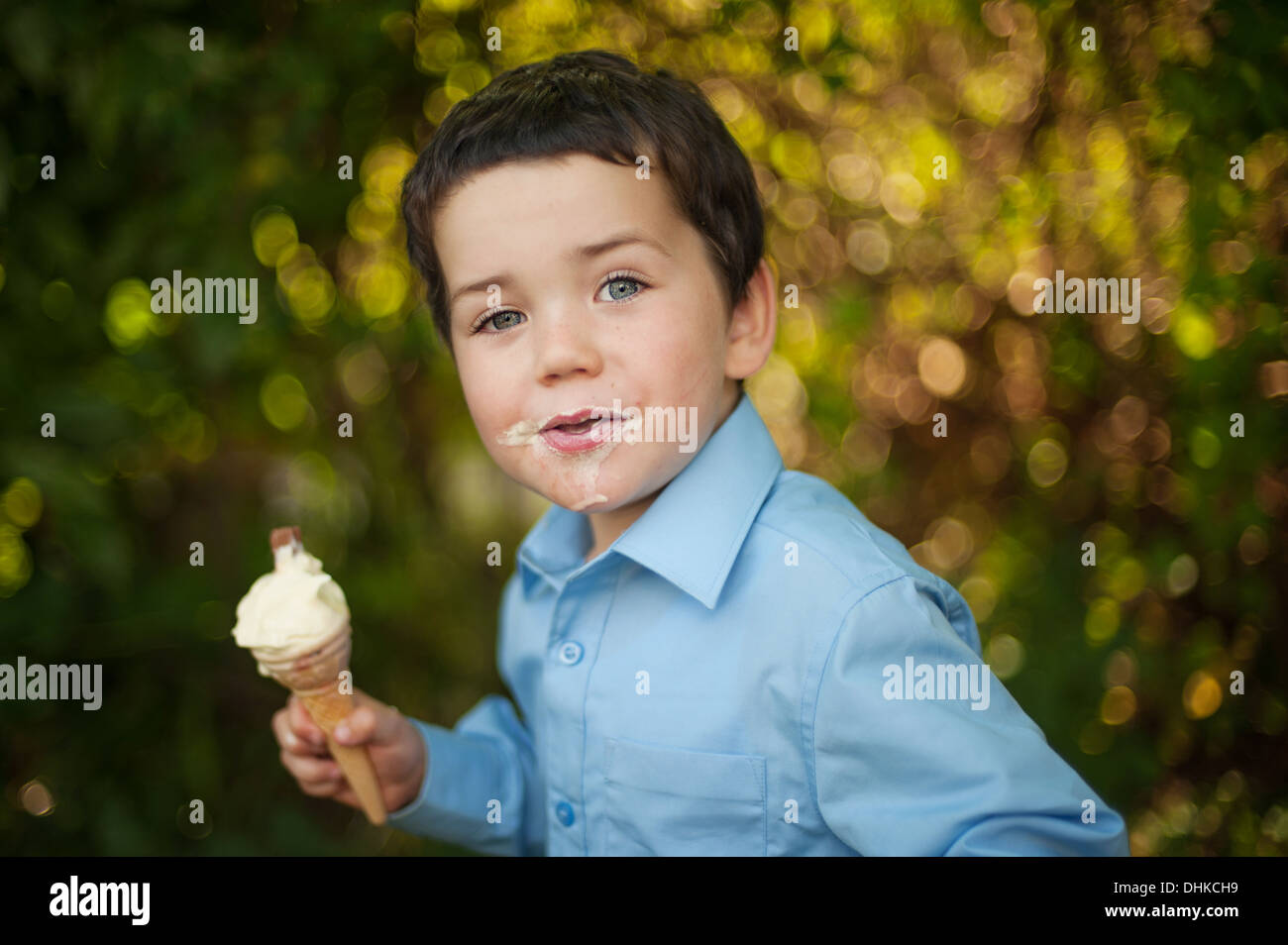 Boy eating ice cream cone hi-res stock photography and images - Alamy