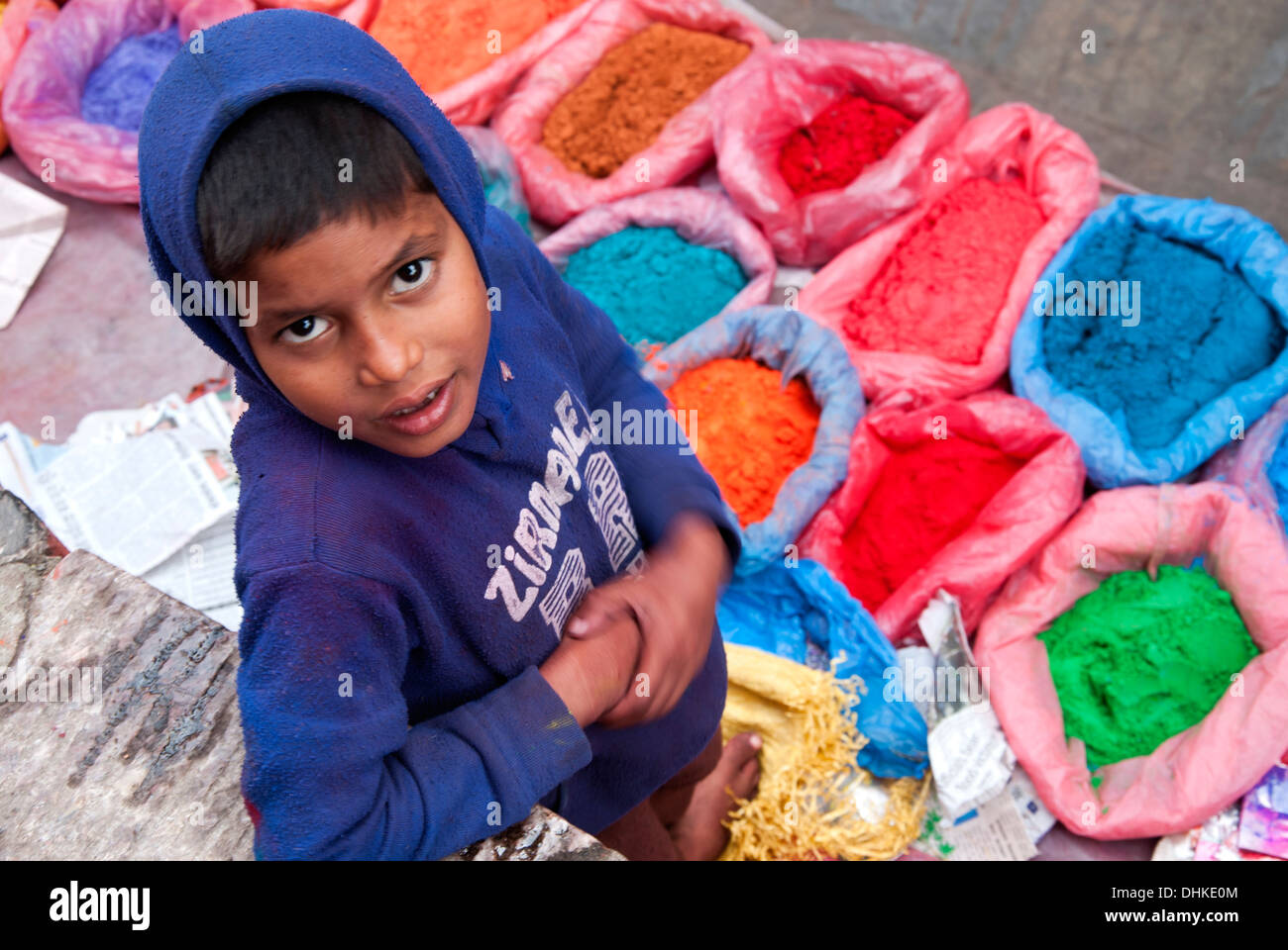 Young boy selling colors Stock Photo - Alamy