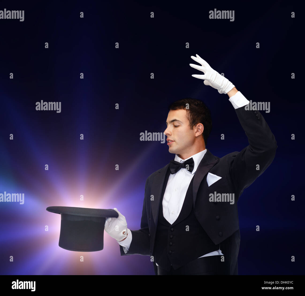 magician in top hat showing trick Stock Photo - Alamy