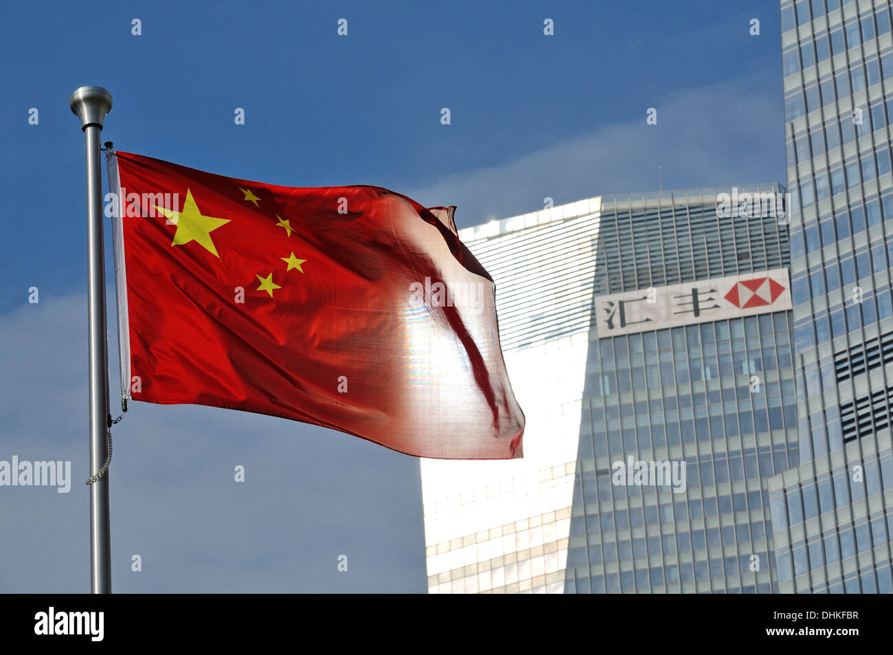 Chinese flag in front of high rise buildings in People's park, Shanghai ...