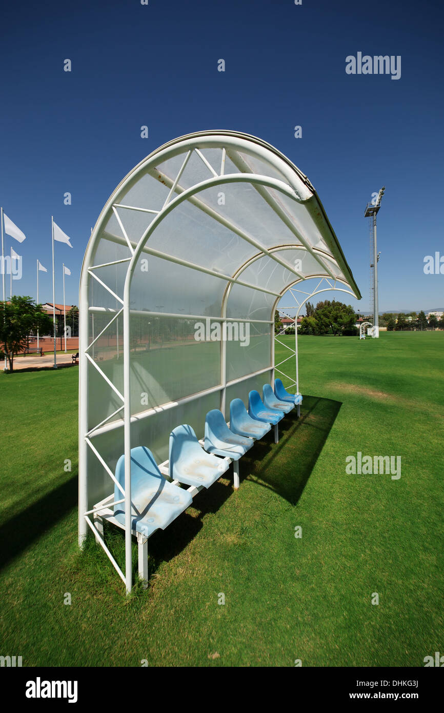 Reserve and staff bench in sport stadium Stock Photo - Alamy