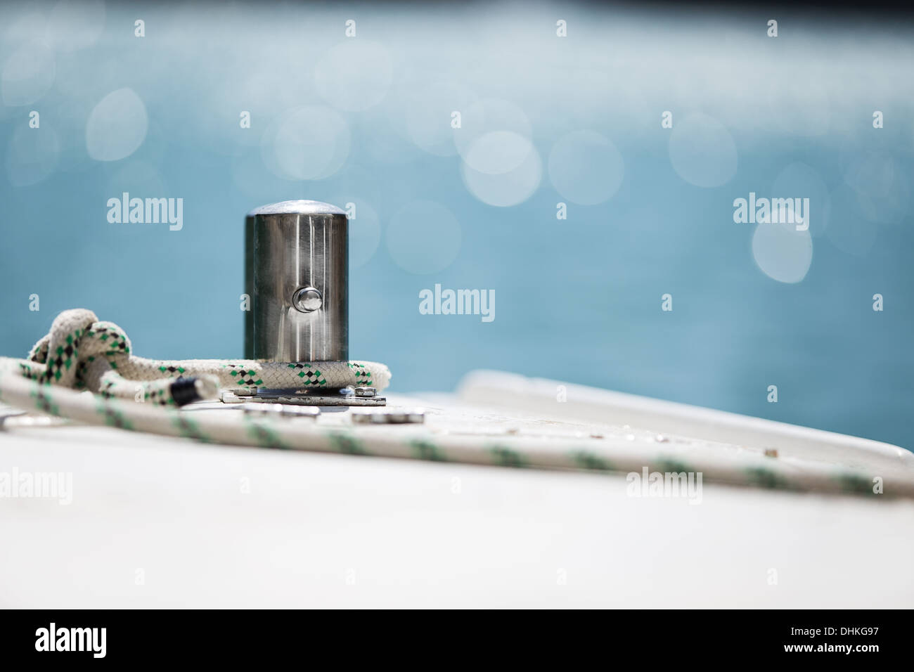 White mooring rope tied around steel anchor on boat or ship Stock Photo ...