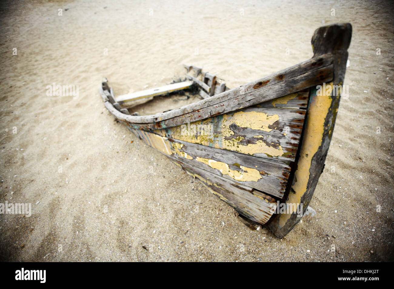 Color picture of an abandoned boat stuck in sand Stock Photo - Alamy