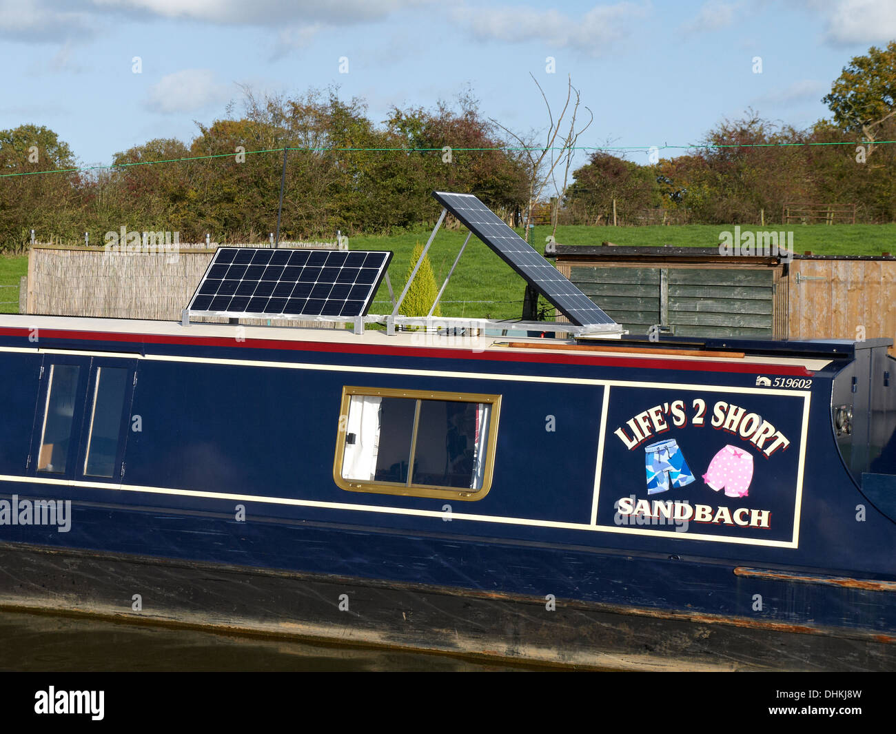 Solar panels energy supply on narrowboat called Life's 2 short UK Stock ...