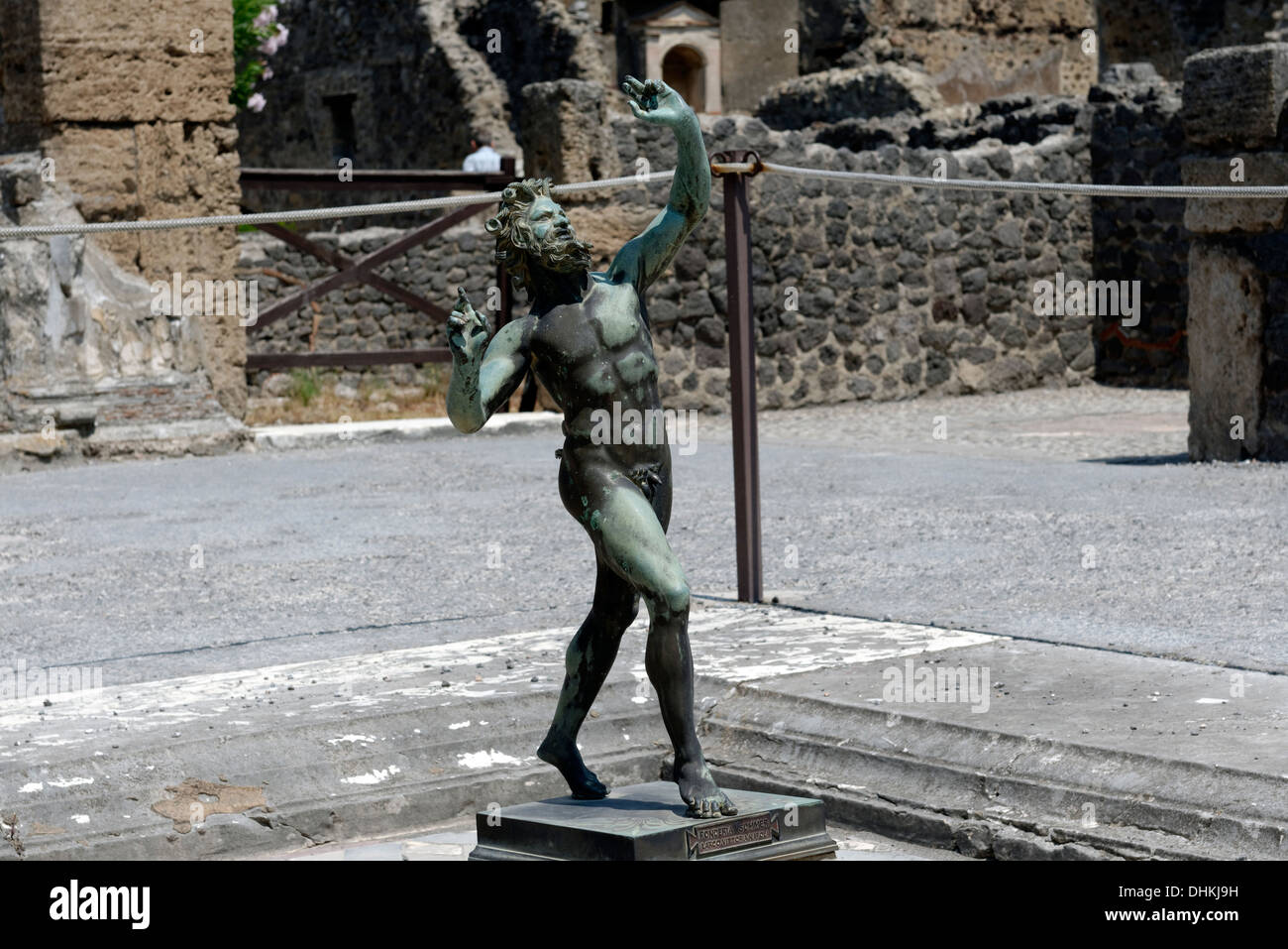 The bronze statue of the Dancing faun in the Tuscan styled Atrium with ...