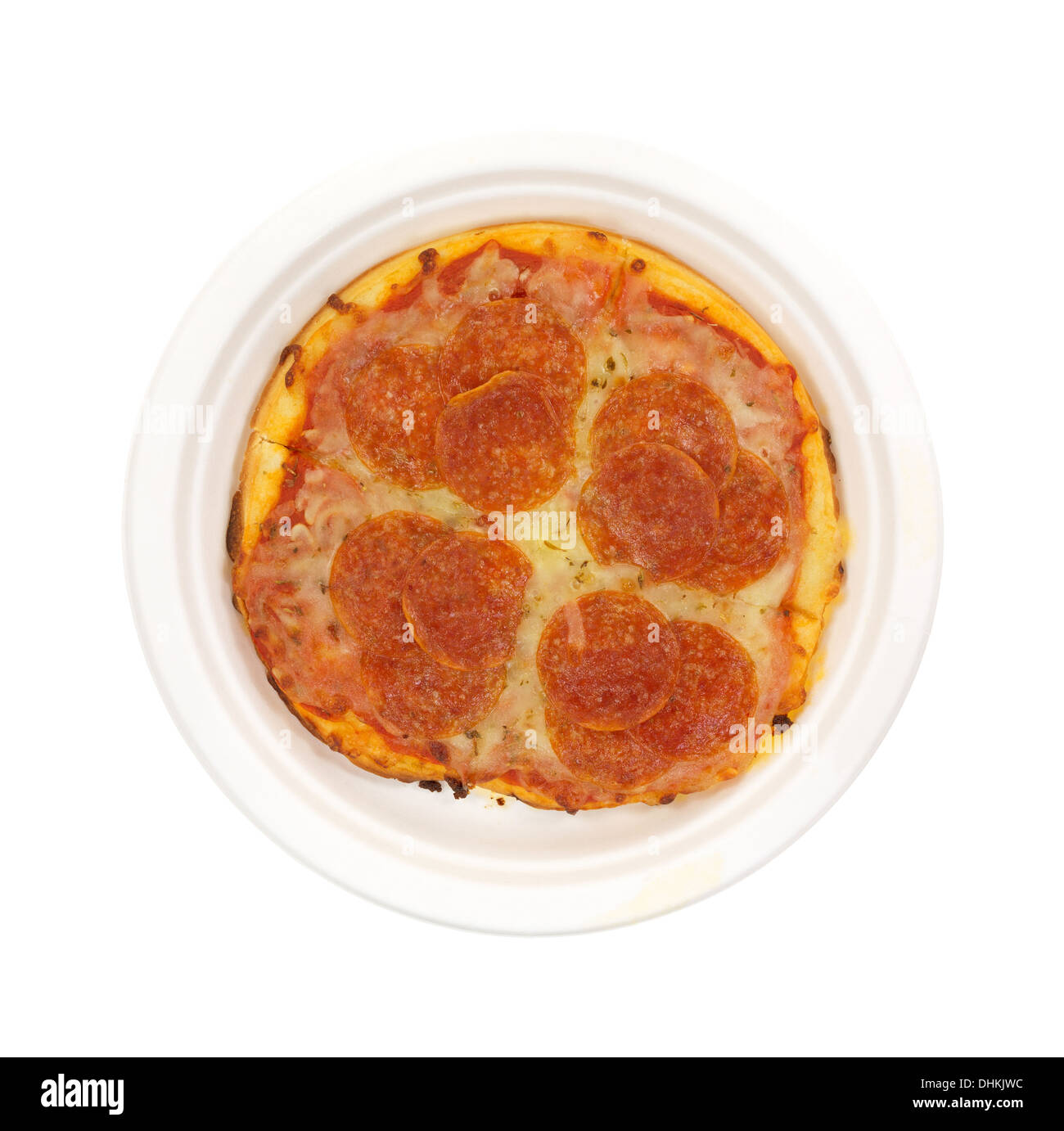Top view of a small pepperoni pizza on a white paper plate Stock Photo ...