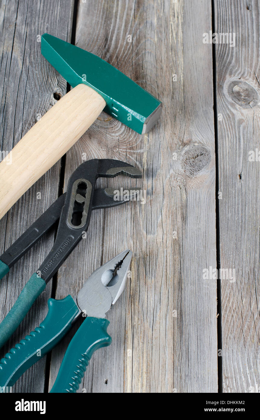 Set building tools on old boards Stock Photo - Alamy