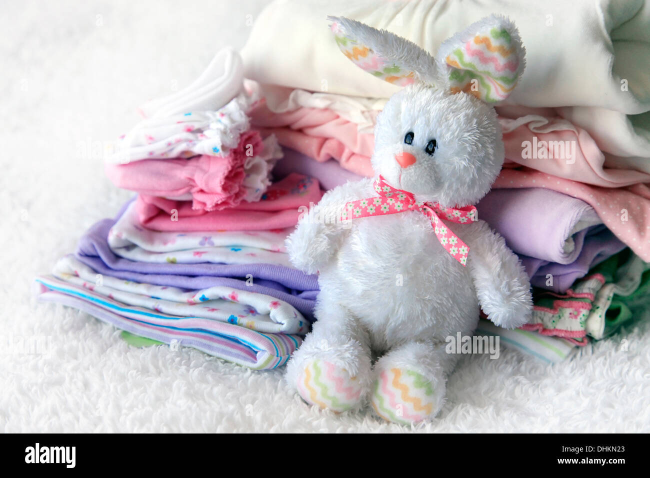 Lot of different baby clothes for the newborn Stock Photo - Alamy
