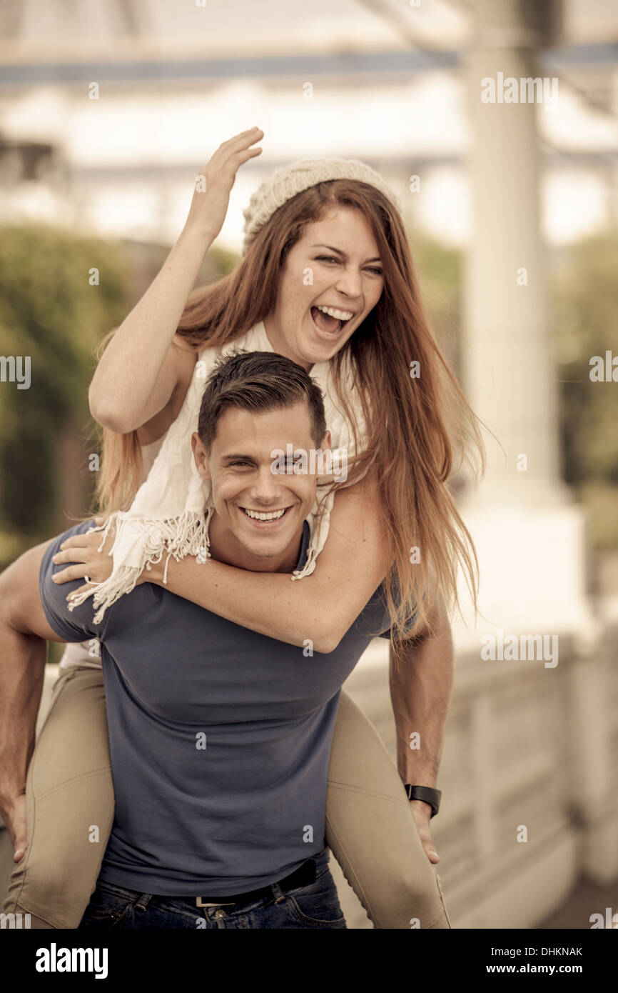 Piggy Back Ride Woman And Man High Resolution Stock Photography and ...