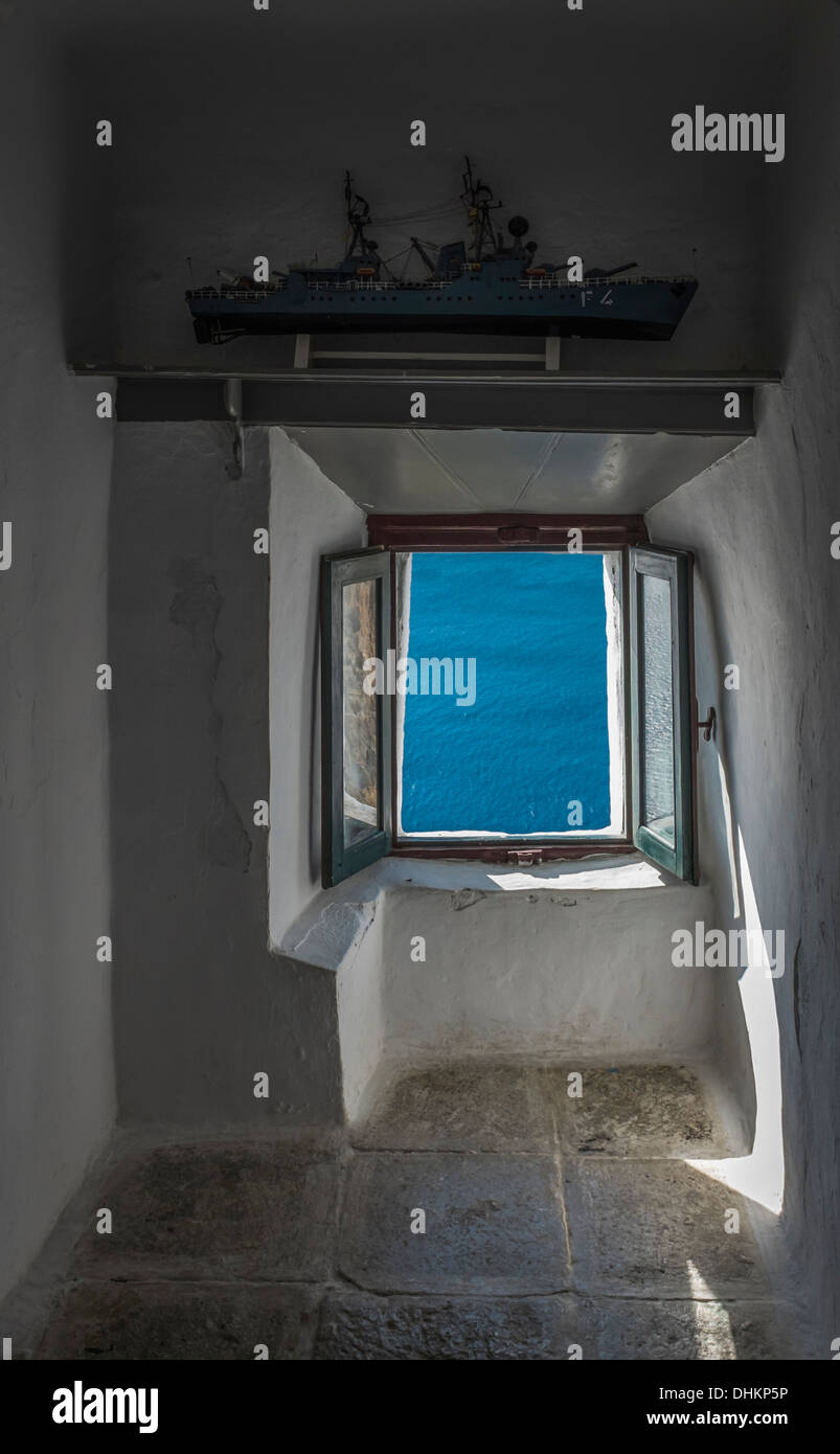 View looking out from a window in the Monastery of Panagia Hozoviotissa ...