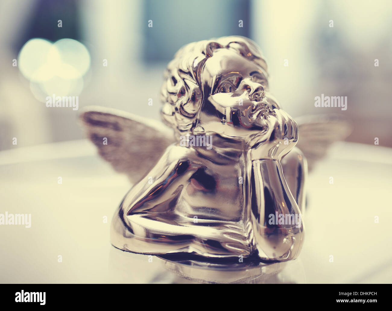 Silver angel, retro tinted photo Stock Photo - Alamy