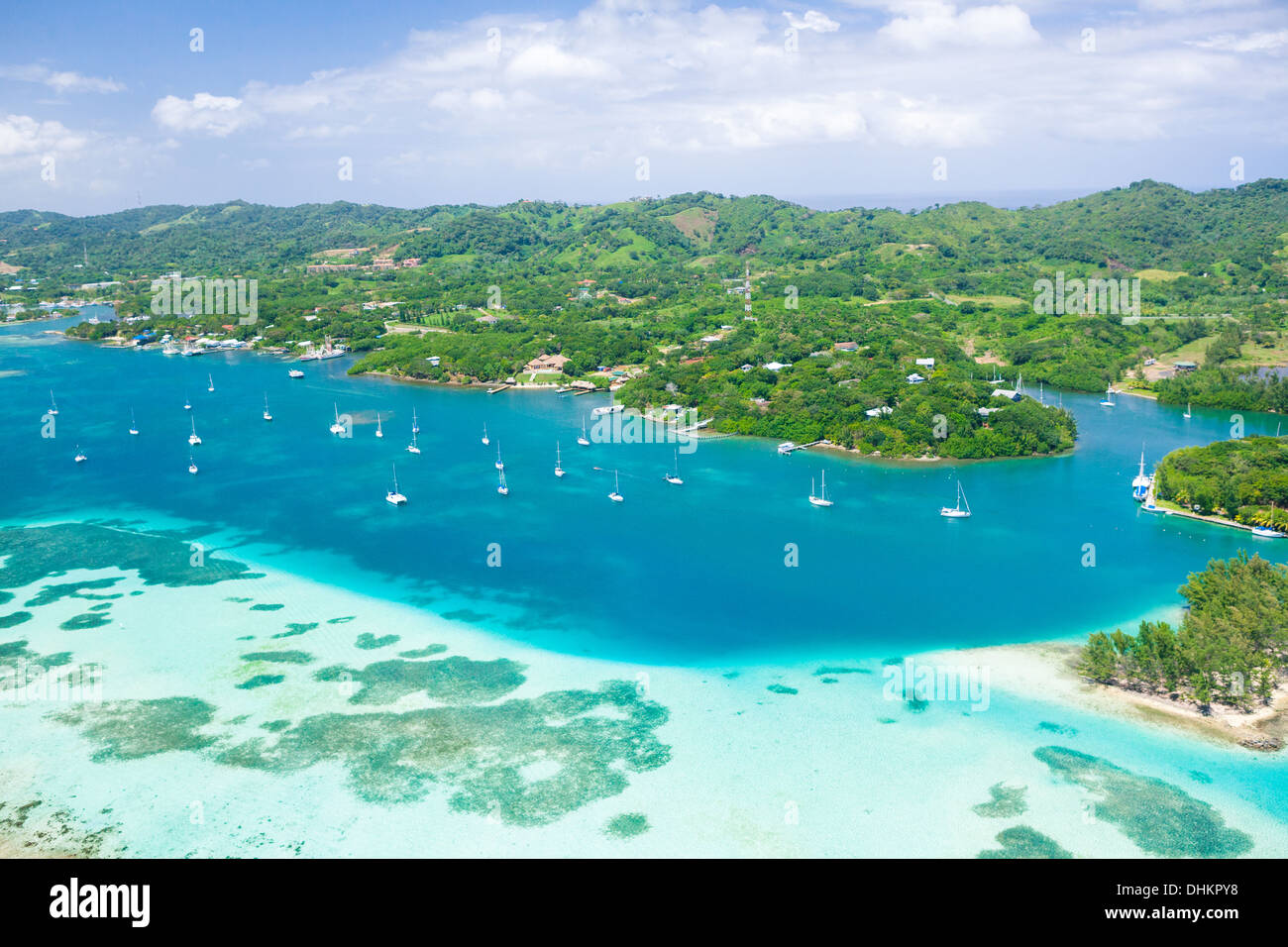 Aerial photo of sailboats mored in French Harbor on the island of ...