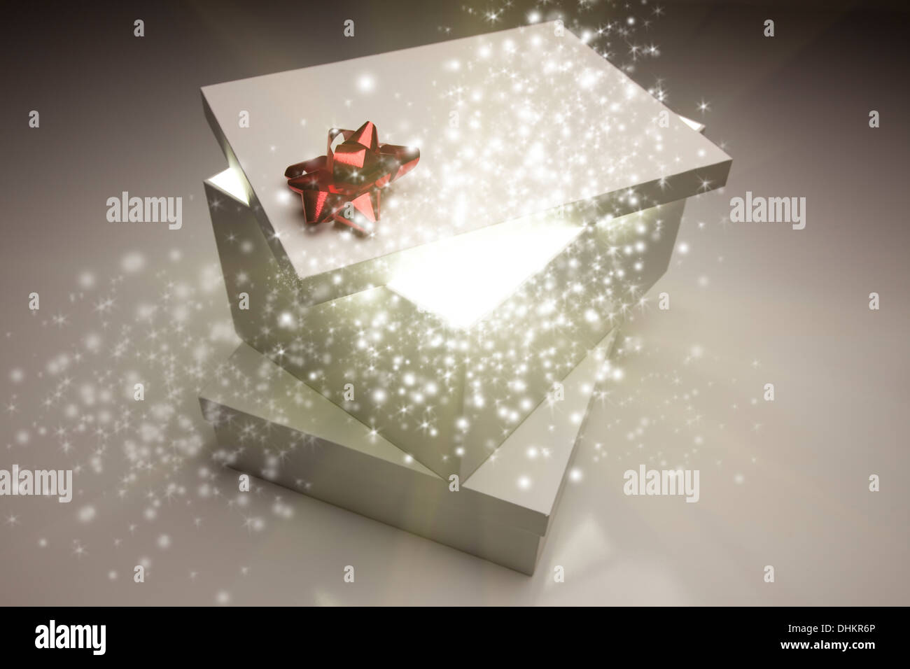 Stack of Christmas Presents With Magical Sparkling Light Coming From ...