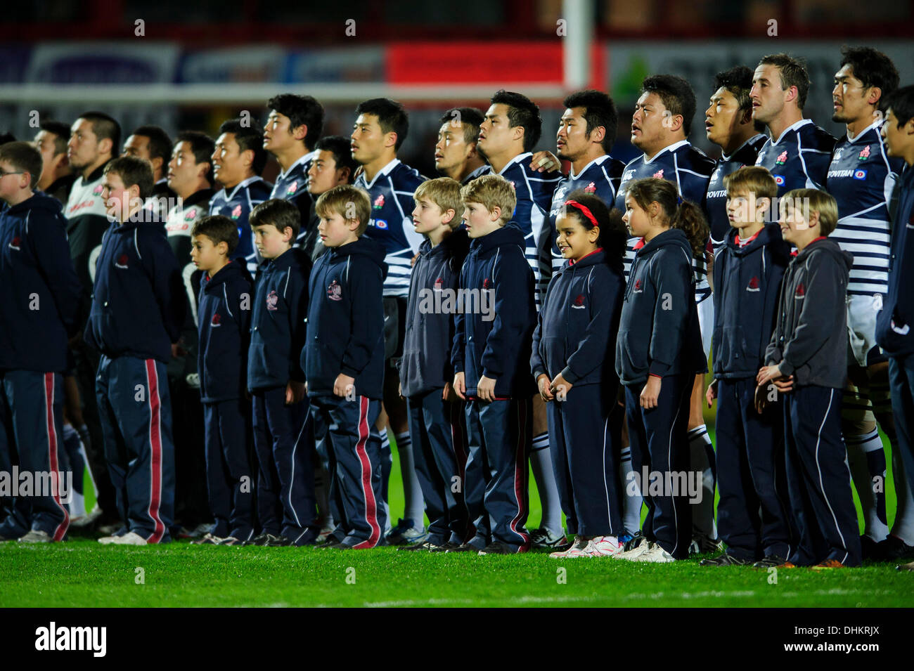 Japan line up for the national anthem hi-res stock photography and ...