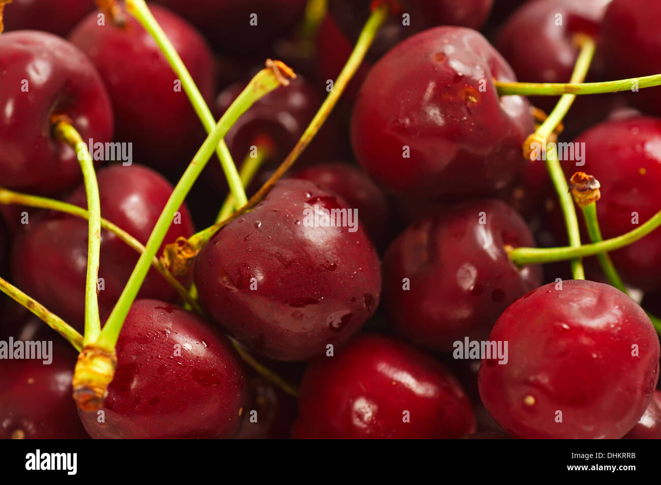 Sweet cherry background Stock Photo - Alamy