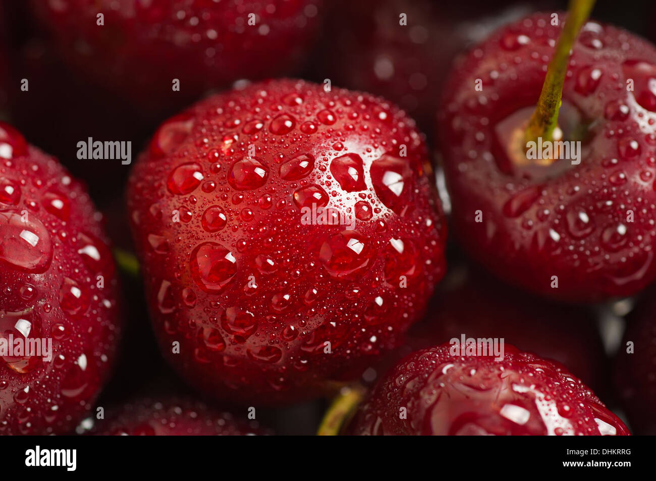 Sweet cherry background Stock Photo - Alamy