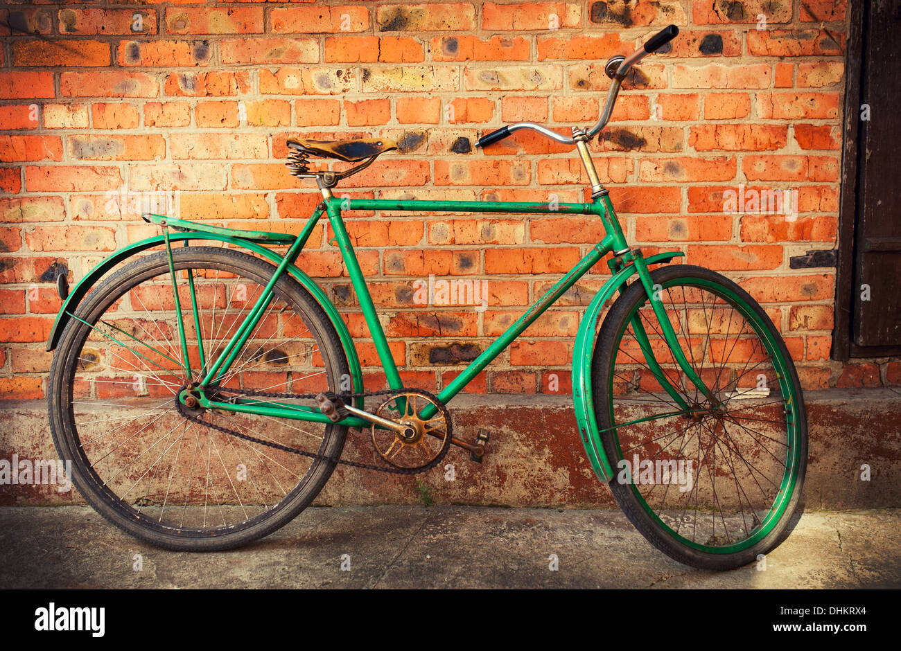 Bicycle against the wall hi-res stock photography and images - Alamy