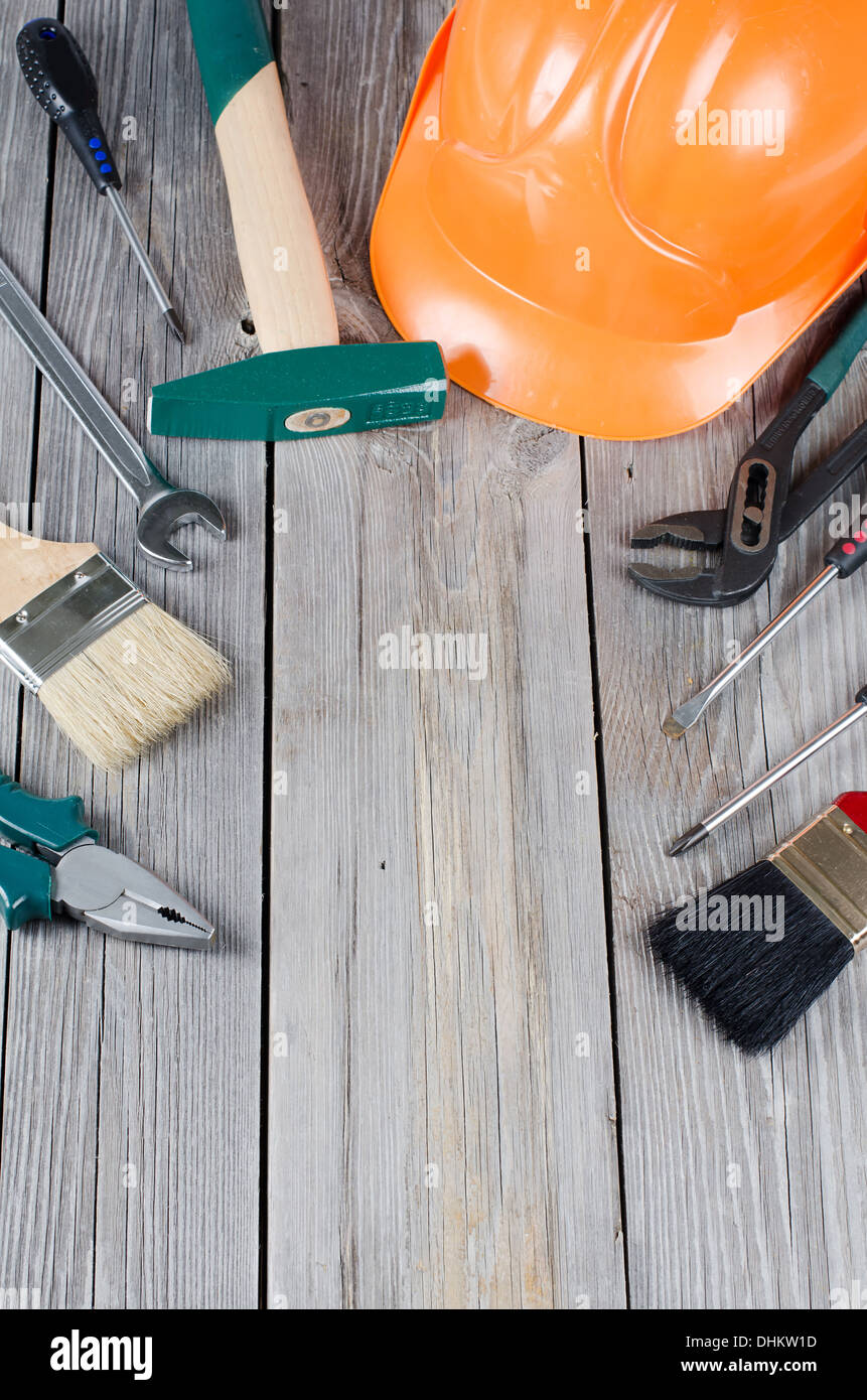 Set building tools on old boards Stock Photo - Alamy