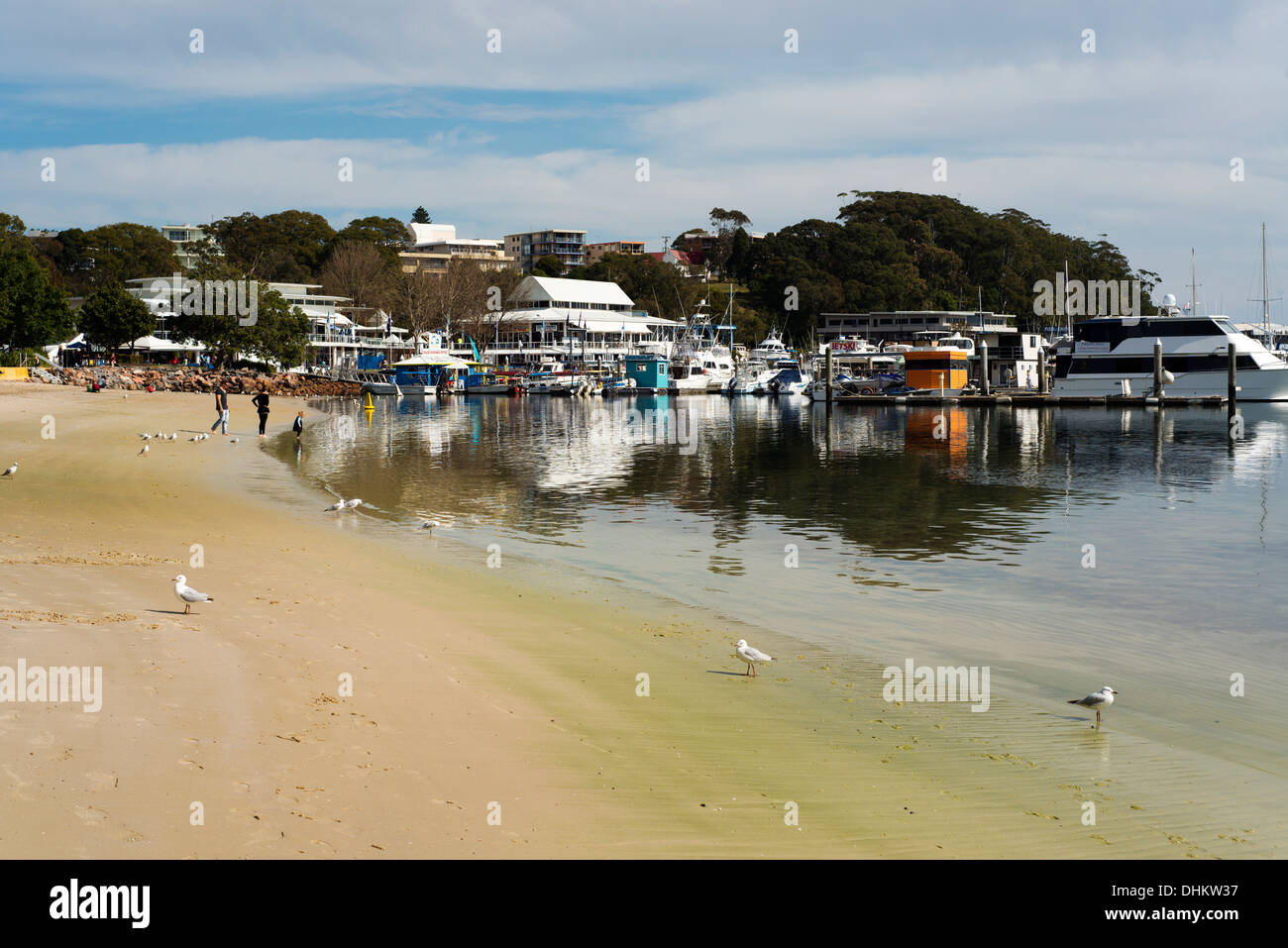 Beach, boats, cafes and restaurants at Port Stephens, a holiday village ...