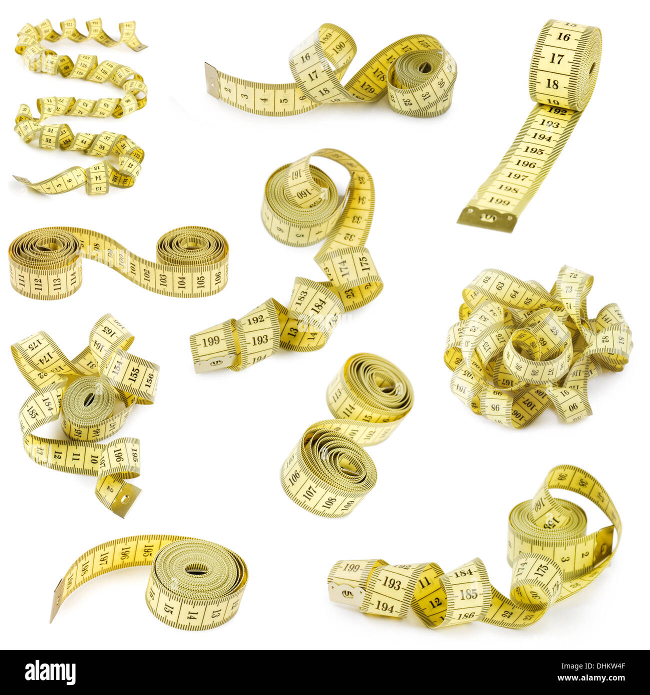 Yellow measuring tape isolated on white Stock Photo - Alamy