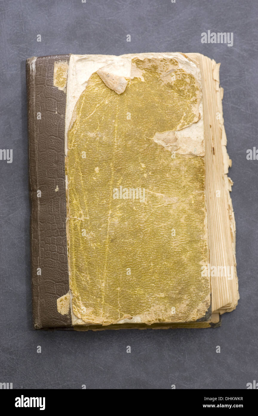 The ancient book on a grey Stock Photo - Alamy