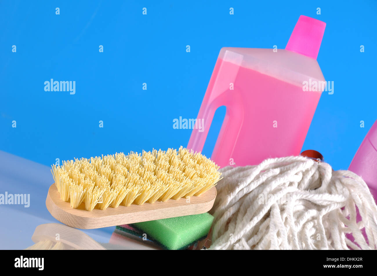 Wash and cleaning on blue background Stock Photo - Alamy