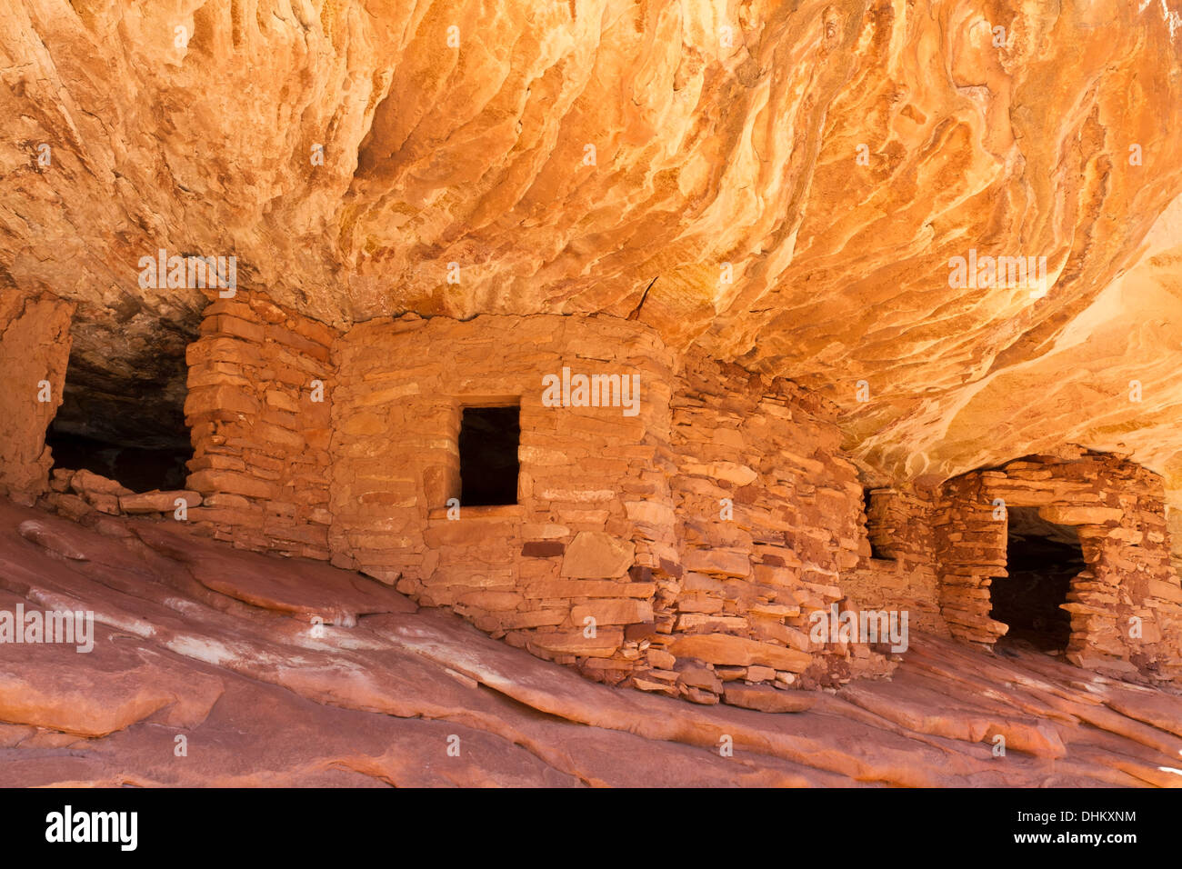 The 'House on Fire' Puebloan ruins under a cliff in Mule Canyon in the ...