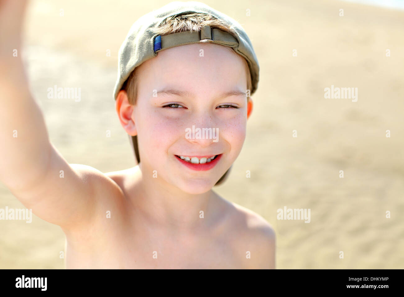 Handsome boy at the beach hi-res stock photography and images - Alamy