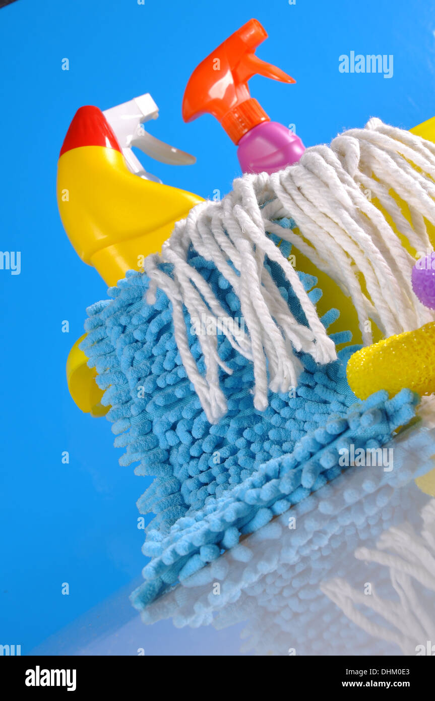Wash and cleaning on blue background Stock Photo - Alamy