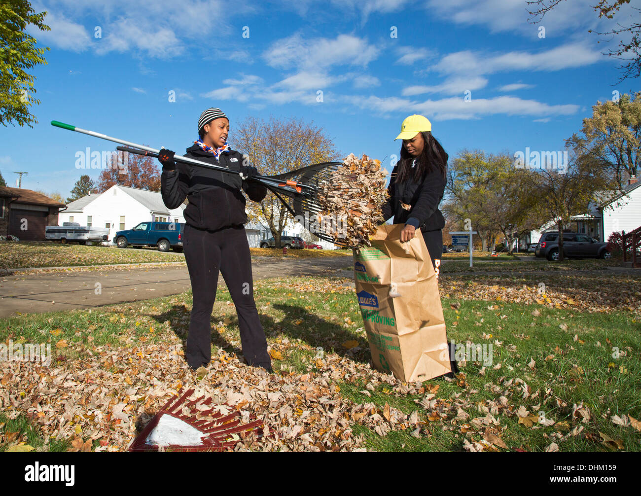 Raking leaves teen hi-res stock photography and images - Alamy