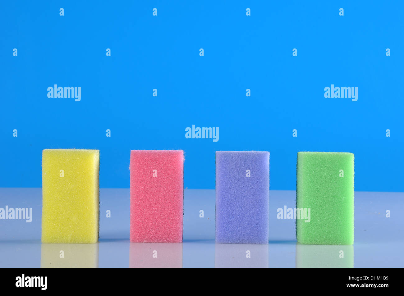 Wash and cleaning on blue background Stock Photo - Alamy