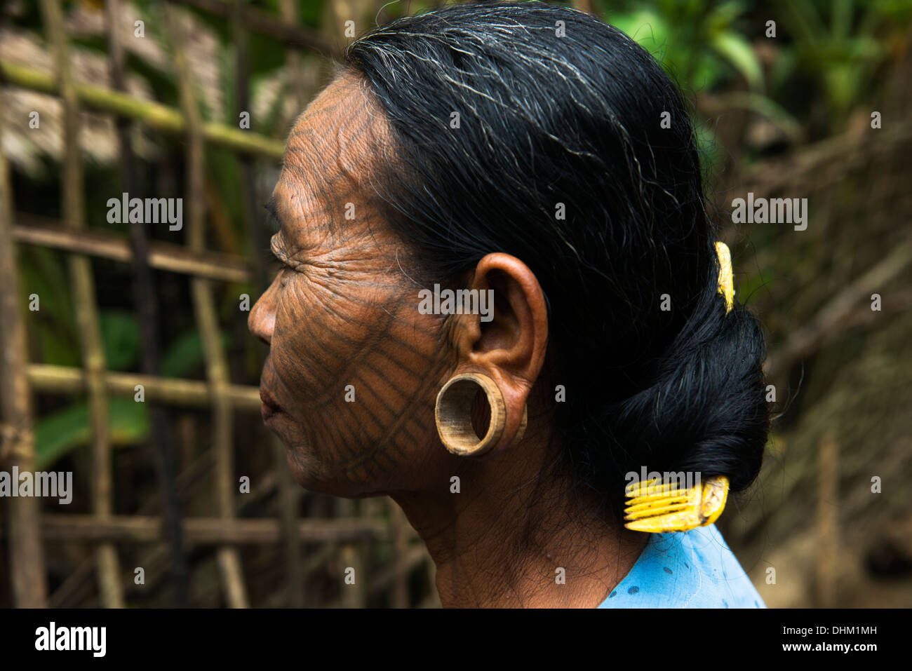 'Spider web' tattooed Chin woman in her village Stock Photo - Alamy