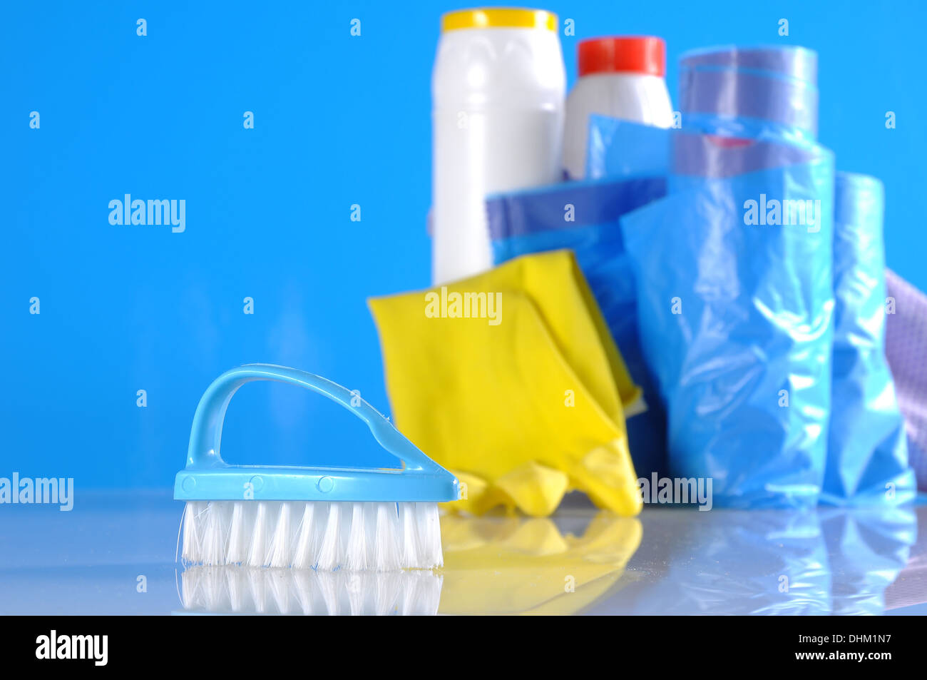 Wash and cleaning on blue background Stock Photo - Alamy