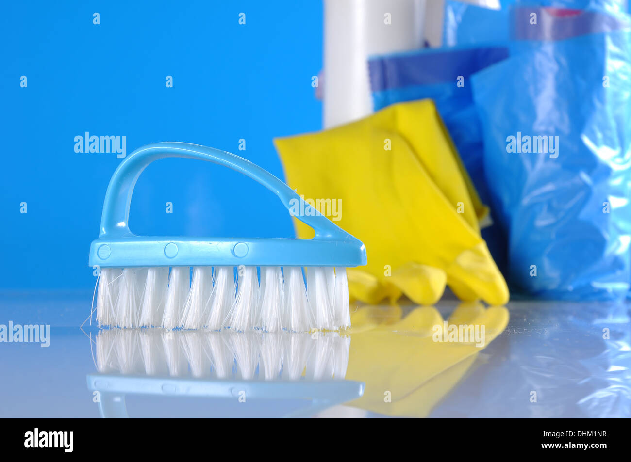 Wash and cleaning on blue background Stock Photo - Alamy