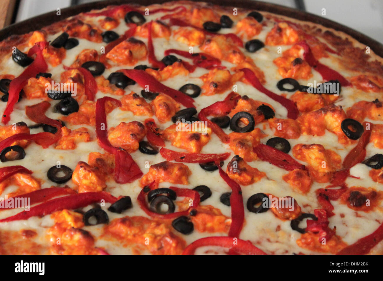 Delicous looking Mid Shot of Buffalo Chickent Pizza Stock Photo - Alamy