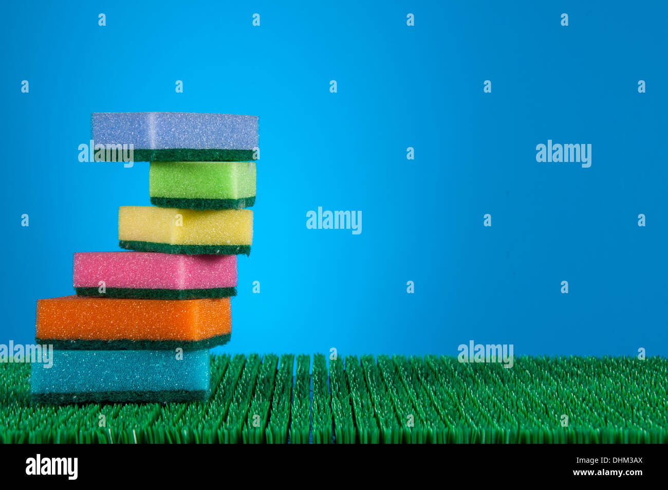 Wash and cleaning on blue background Stock Photo - Alamy