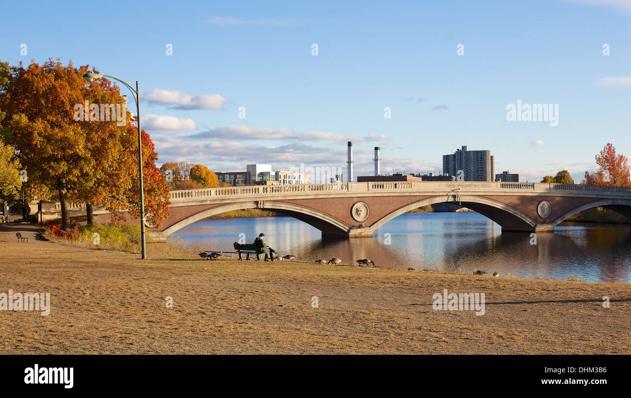 Fall afternoon at Weeks Footbridge on the banks of the Charles river in ...
