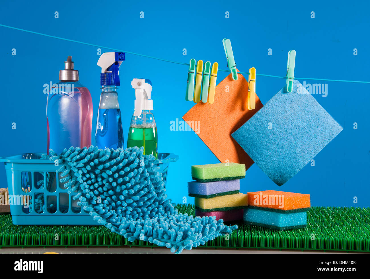 Wash and cleaning on blue background Stock Photo - Alamy