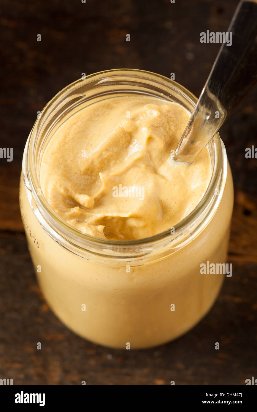 Organic Yellow Mustard Condiment in a Bowl Stock Photo - Alamy