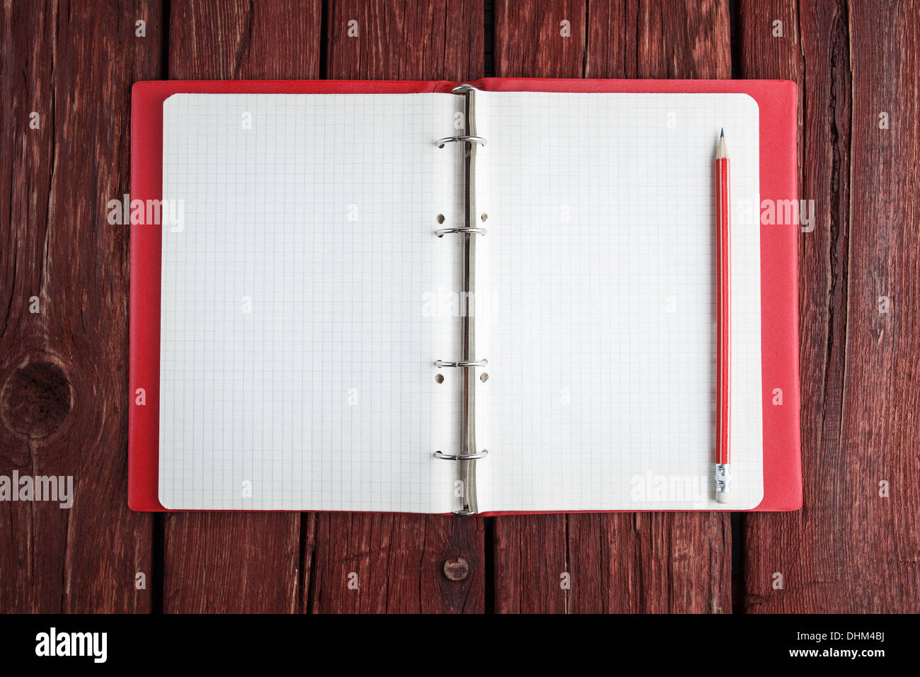 Open blank notepad with a pencil laying on old wooden table Stock Photo ...