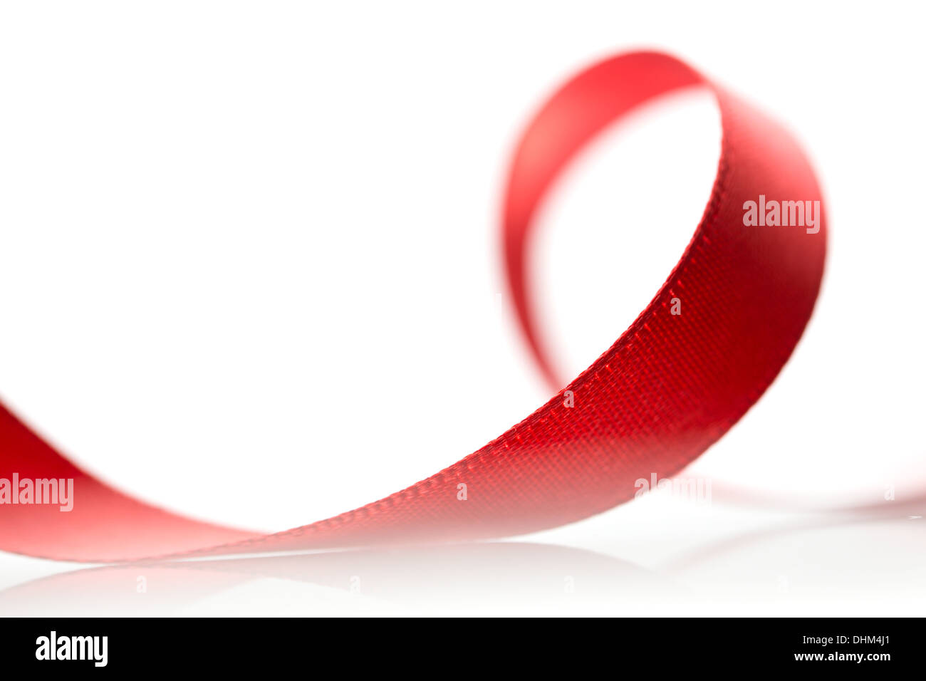 Beautiful fabric red ribbon on white background Stock Photo - Alamy