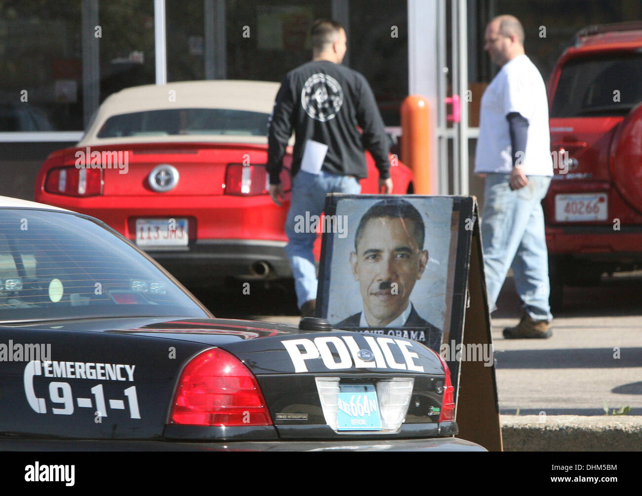 US President Obama on a poster with a Hitler moustache The United ...