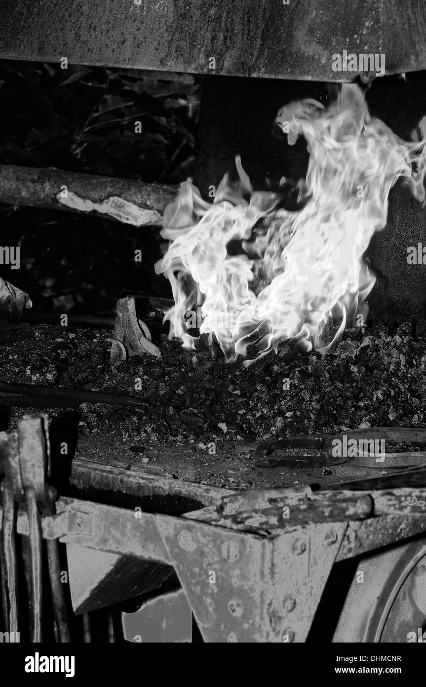 Old craft hot iron forging Black and White Stock Photos & Images - Alamy