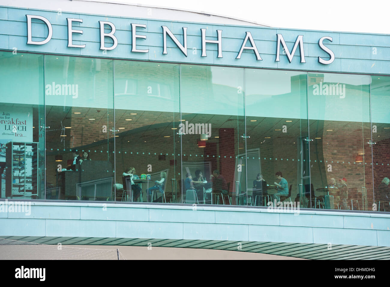 People sitting in the window of the cafe at Debenhams department store ...
