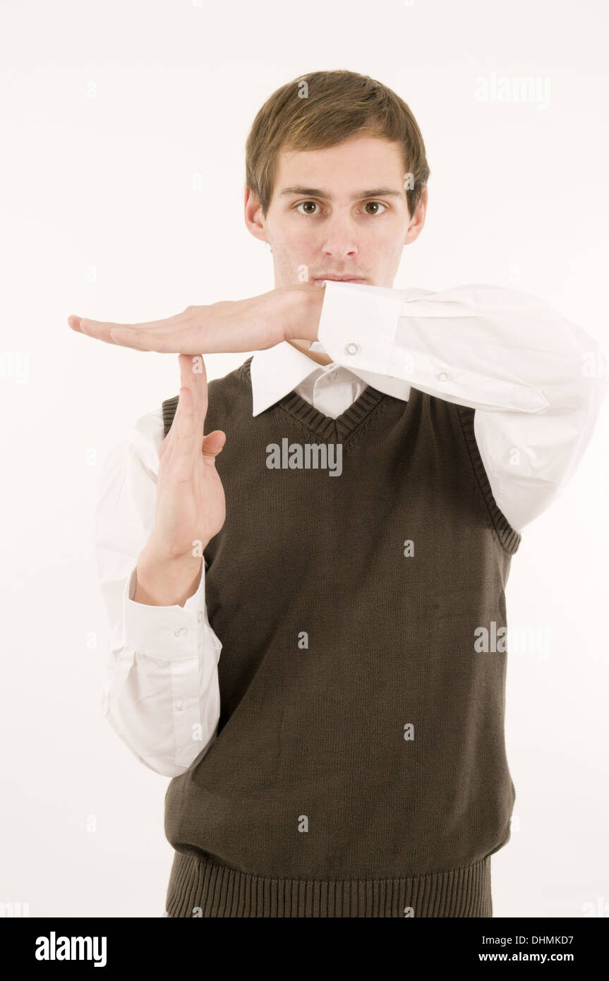 man show time out hand sign low head Stock Photo - Alamy